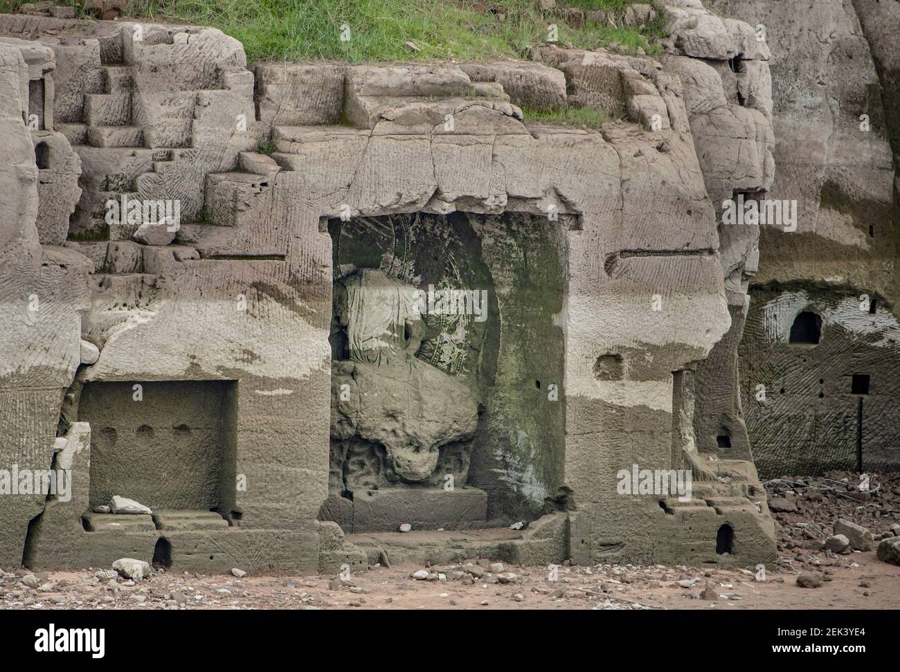 View of the Tang-dynasty sitting buddha sculptures exposed from a water ...
