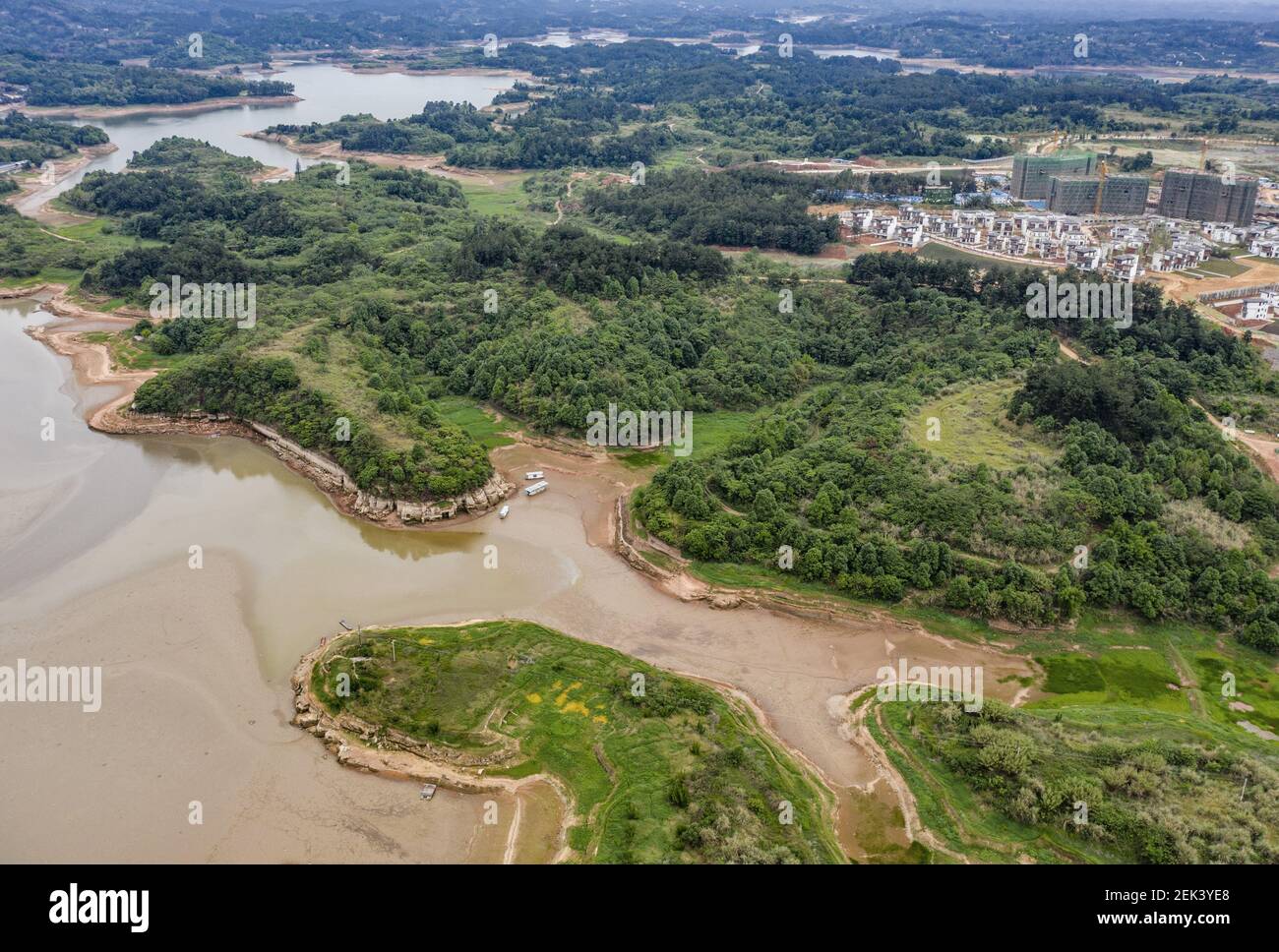 View of the Tang-dynasty sitting buddha sculptures exposed from a water ...