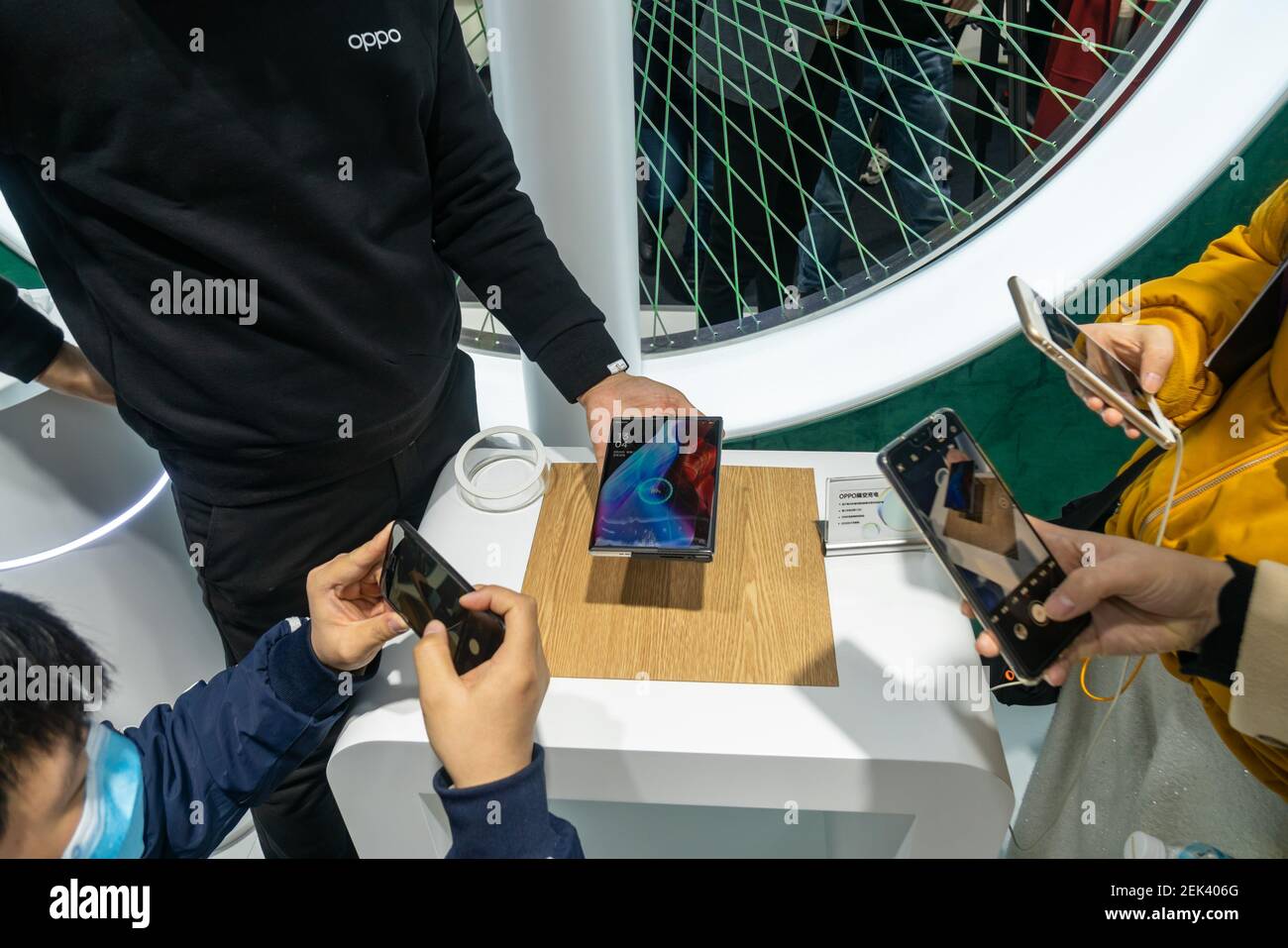 SHANGHAI, CHINA - FEBRUARY 23, 2021 - Visitors take photos of Oppo's ...