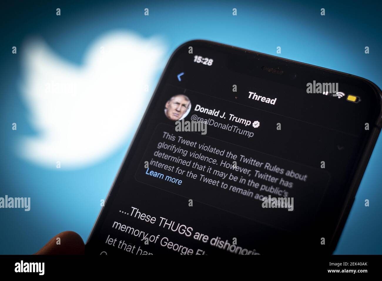 A tweet by US president Donald Trump is seen being flagged as inciting ...