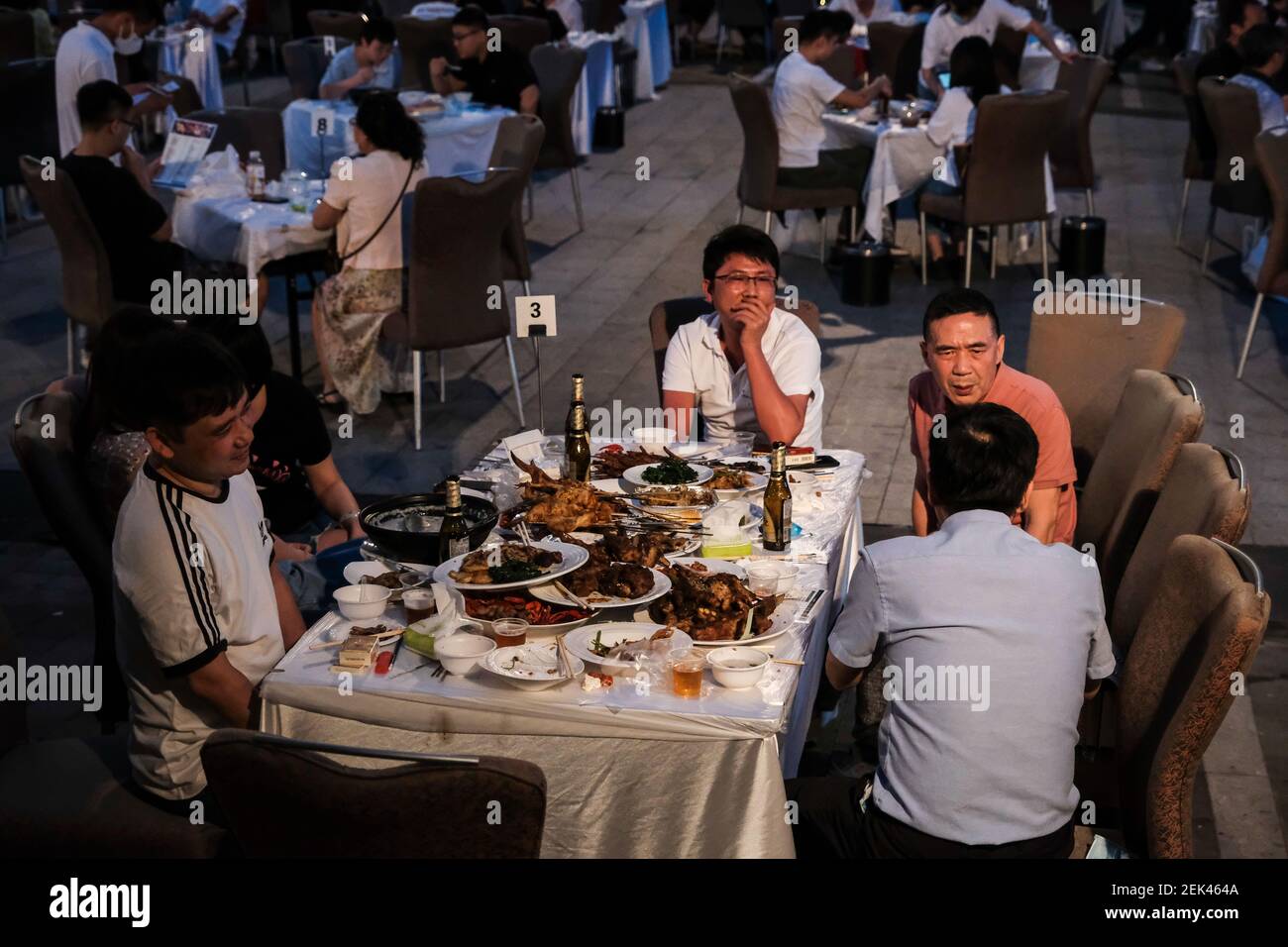 Customers who waited over one hour enjoy the five-star barbecue stall ...