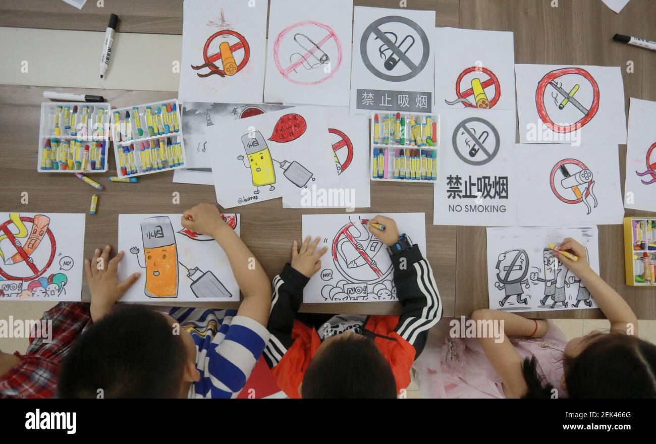 A group of children attend a drawing activity to promote the World No ...