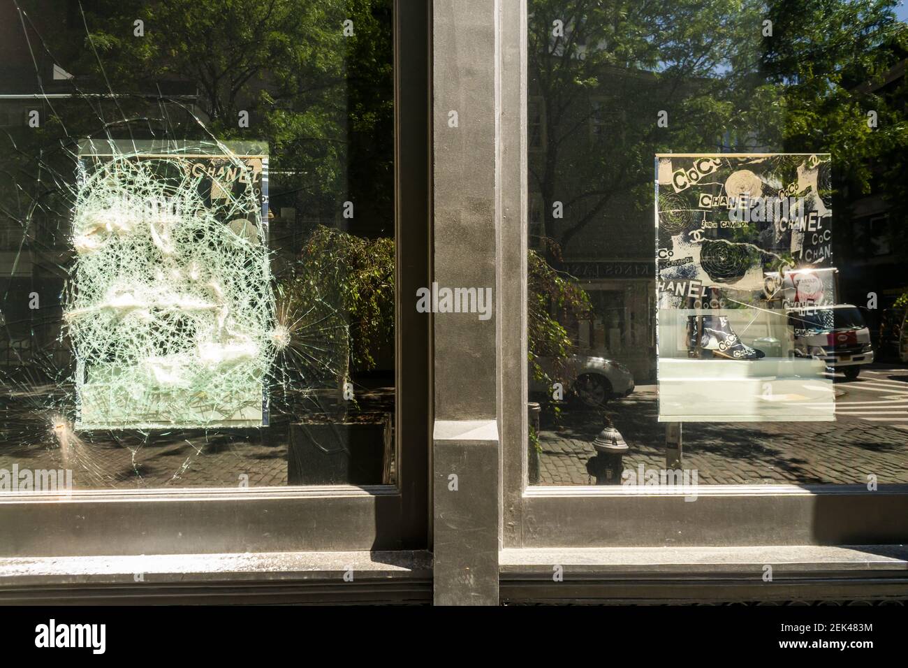 Smashed windows in the Chanel store in Soho in New York after ...