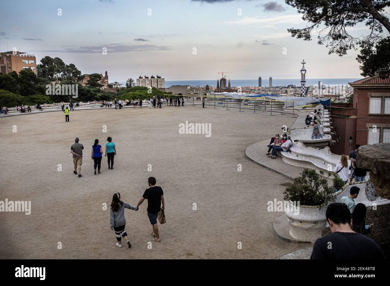 People are seen at the famous Park Guell, without tourists, due to ...