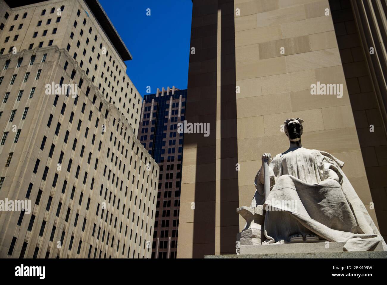 The face of "Industry" is painted black by vandals at the Federal ...