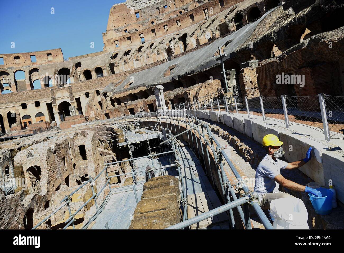 A restorer working inside the Colosseum Roma June 1st 2020. Italy ...