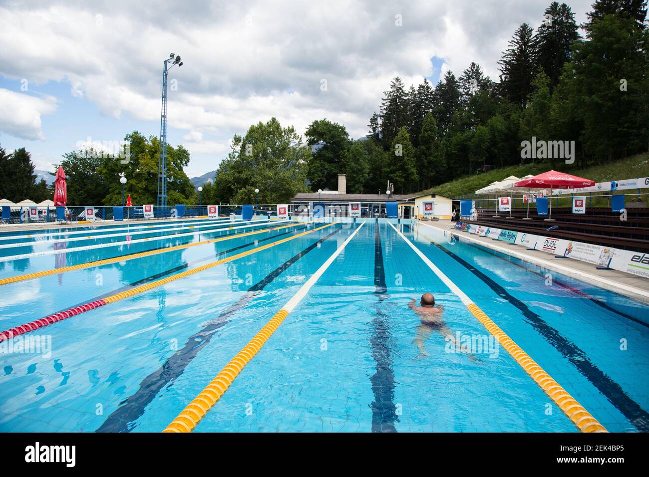A man seen swimming as water parks reopen. Swimming pools reopened ...