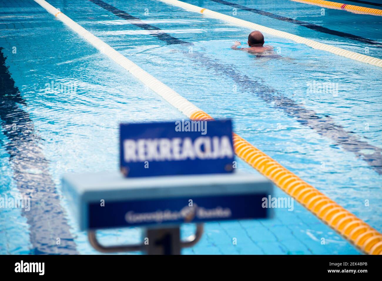 A man seen swimming as water parks reopen. Swimming pools reopened ...