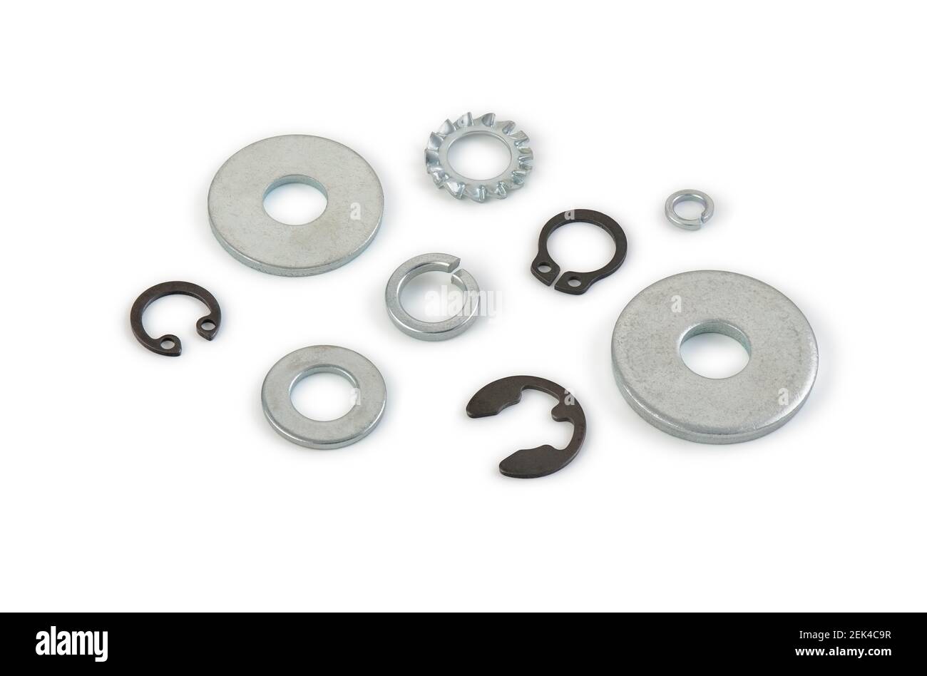 Metal washers different shapes and sizes on a white background, cut out ...