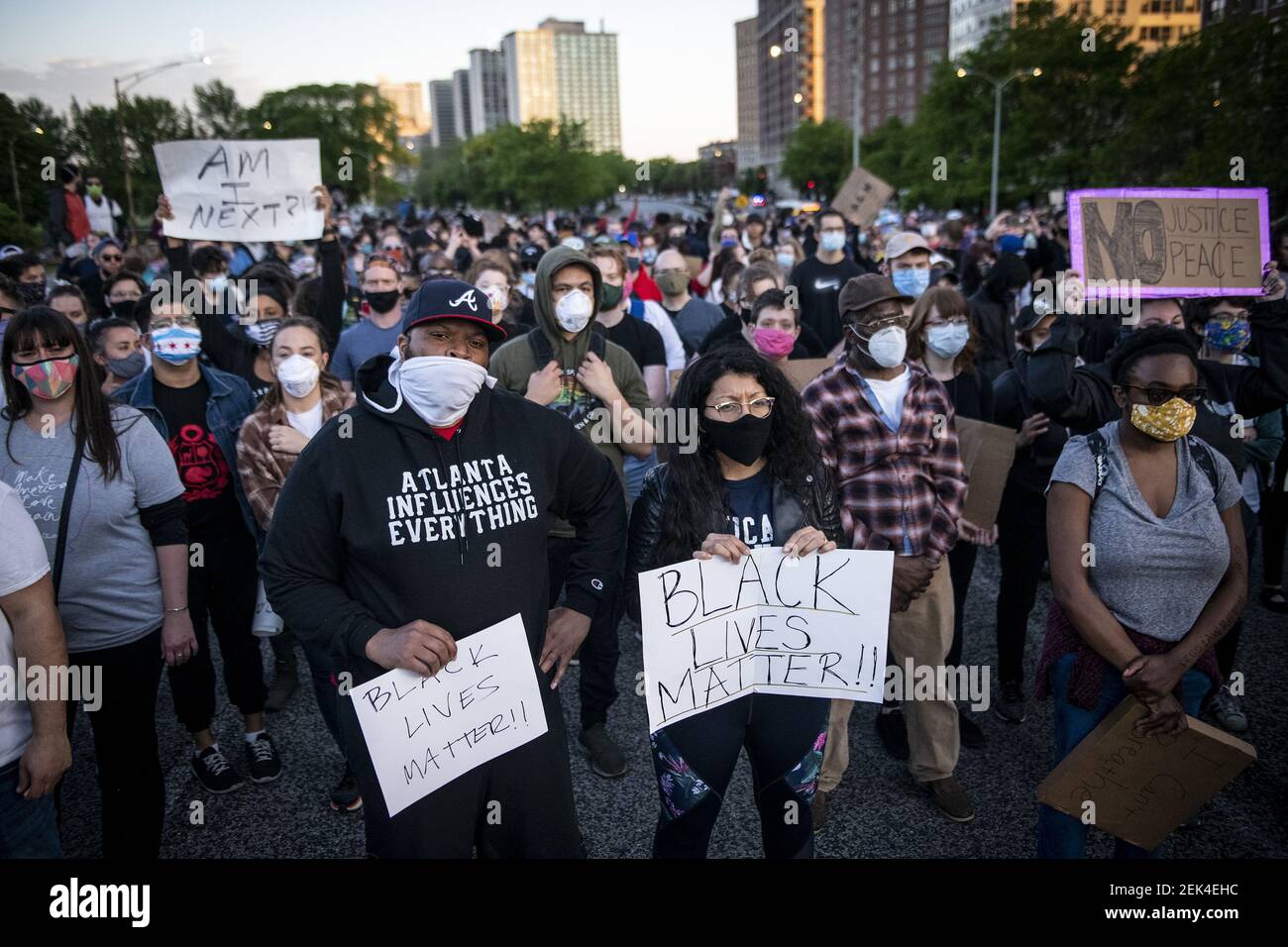 Demonstrator hold a signs while occupying lanes of Lake Shore Drive to ...