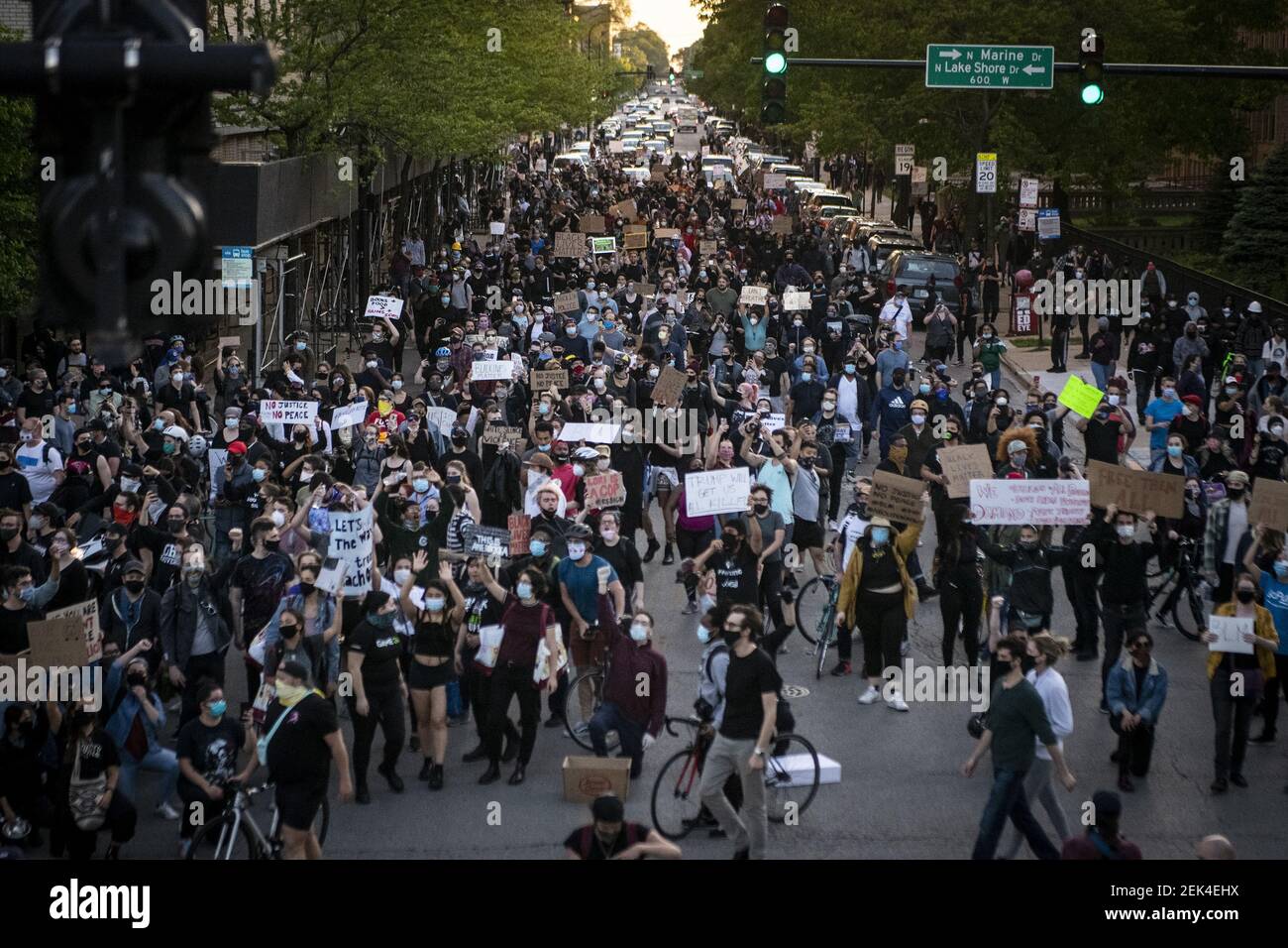 Demonstrators march towards Lake Shore Drive to protest in the Uptown ...