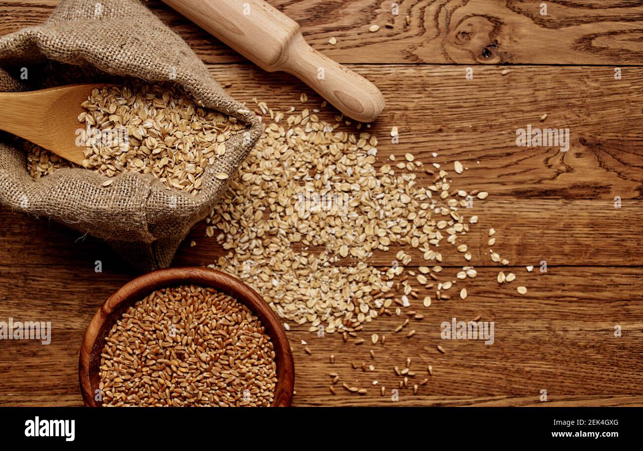 Whole grains cereals cereals wooden board table food preparation Stock ...