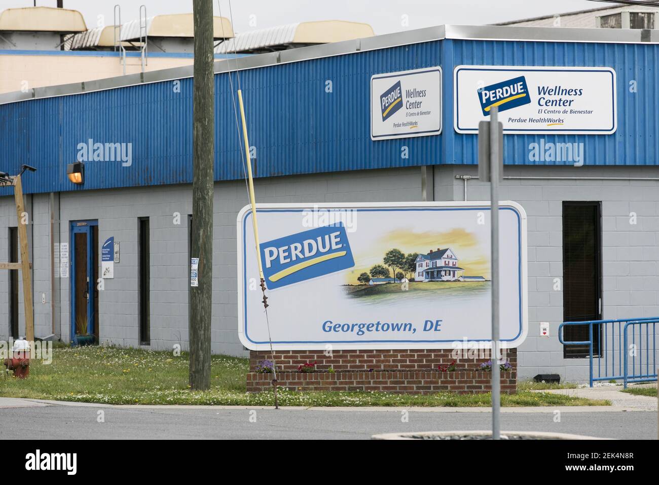 A logo sign outside of a Perdue Farms poultry processing plant in ...