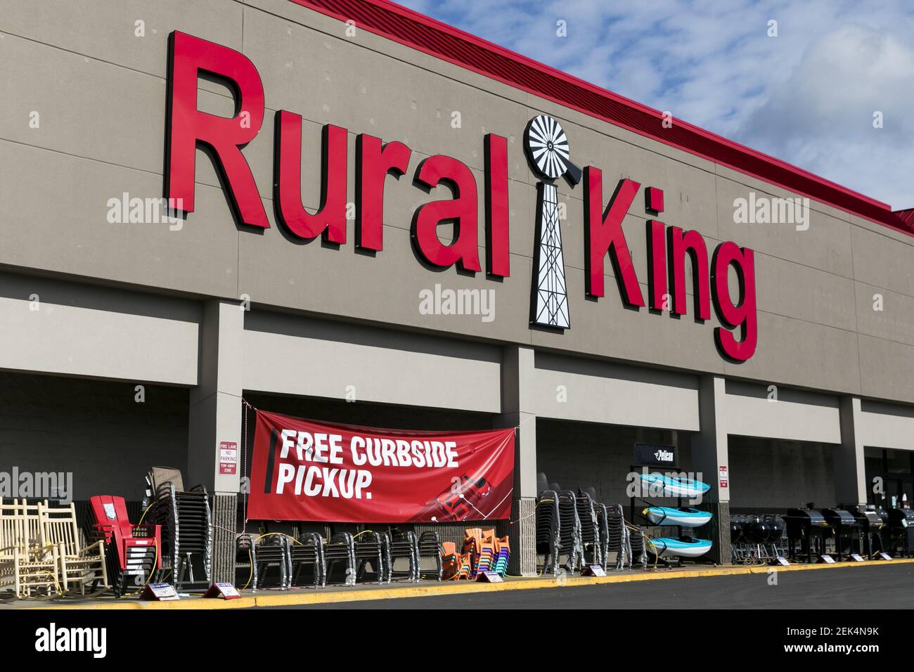 A logo sign outside of a Rural King Supply retail store location in ...