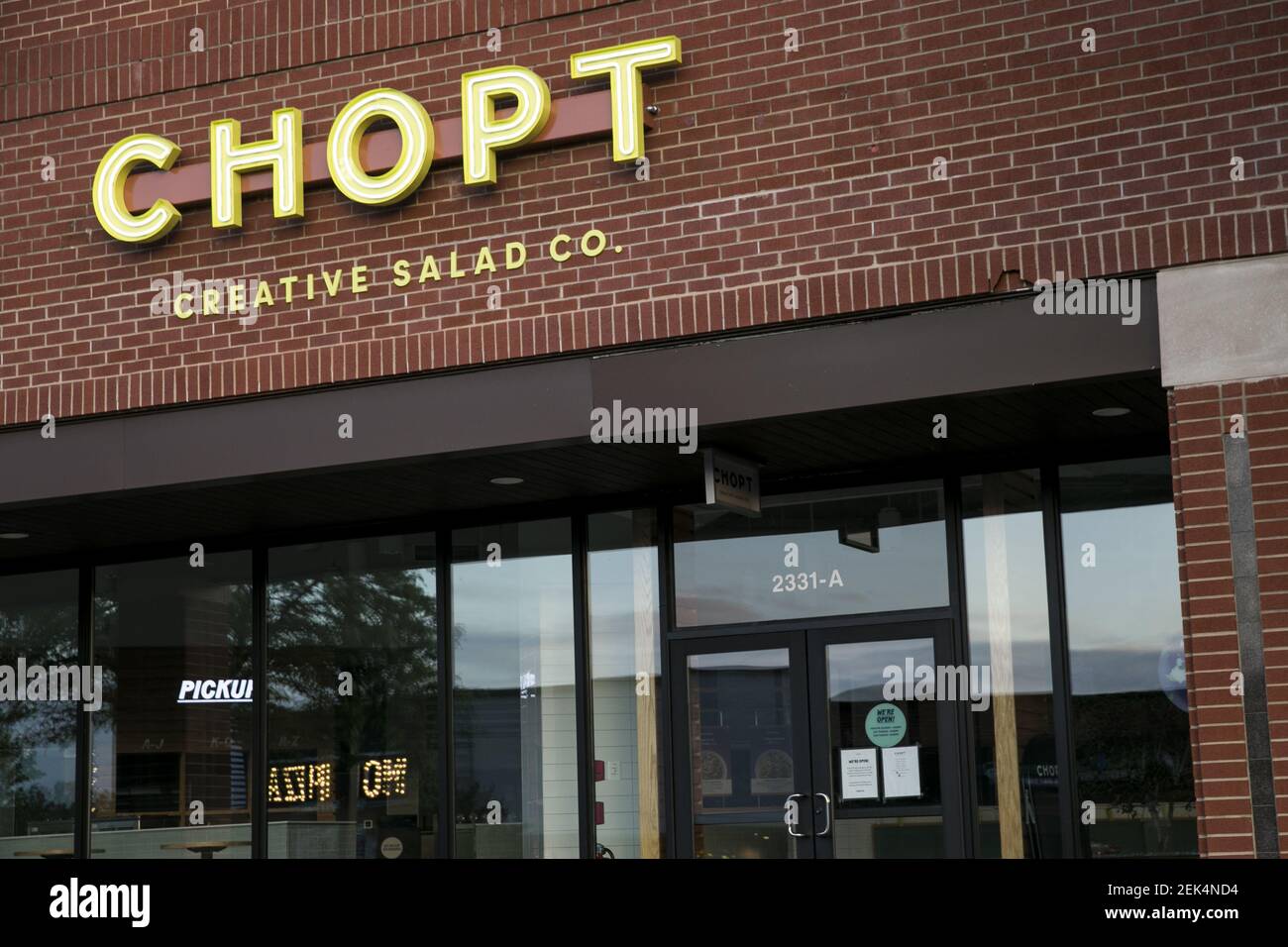 A logo sign outside of a Chopt Creative Salad Company restaurant ...