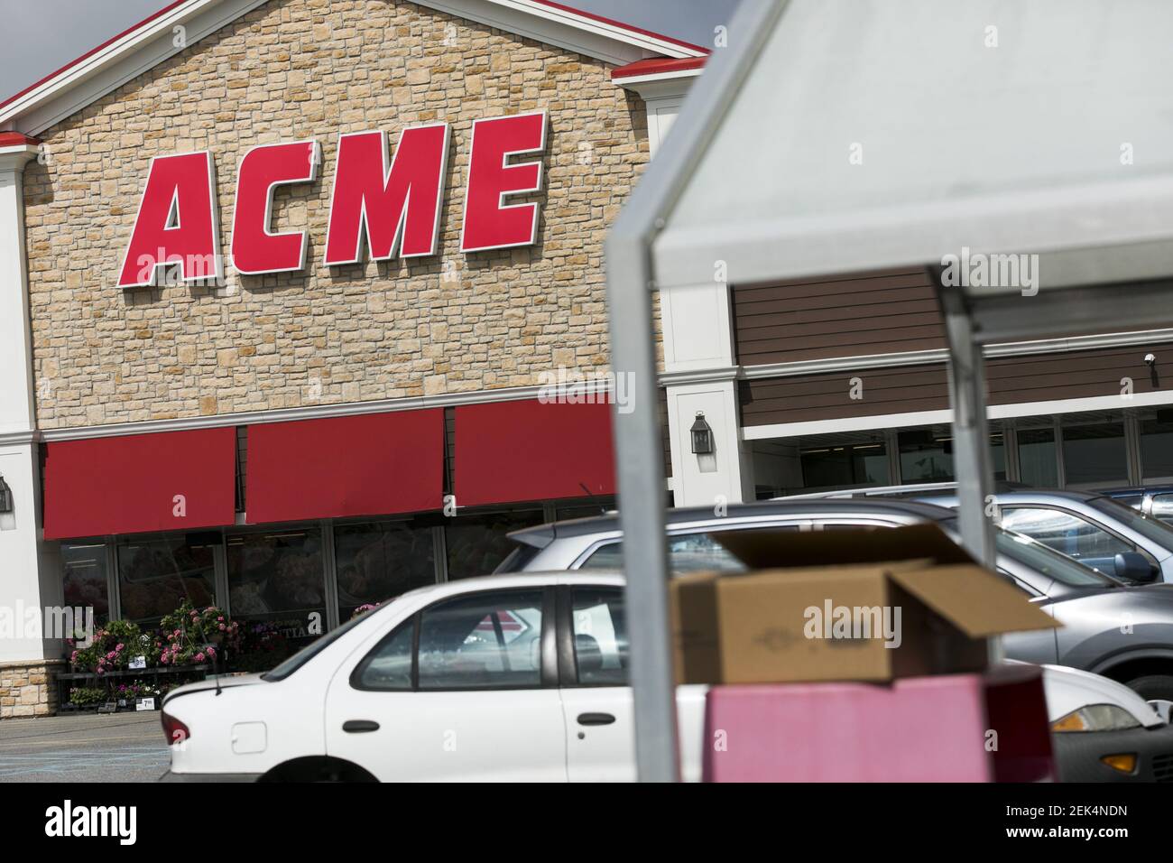 A logo sign outside of Acme retail grocery store location in ...