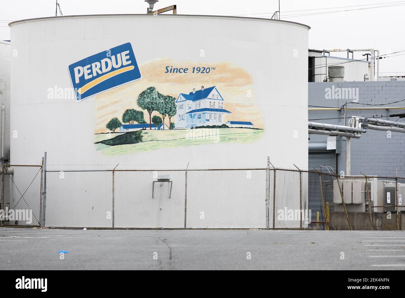 A logo sign outside of a Perdue Farms poultry processing plant in ...