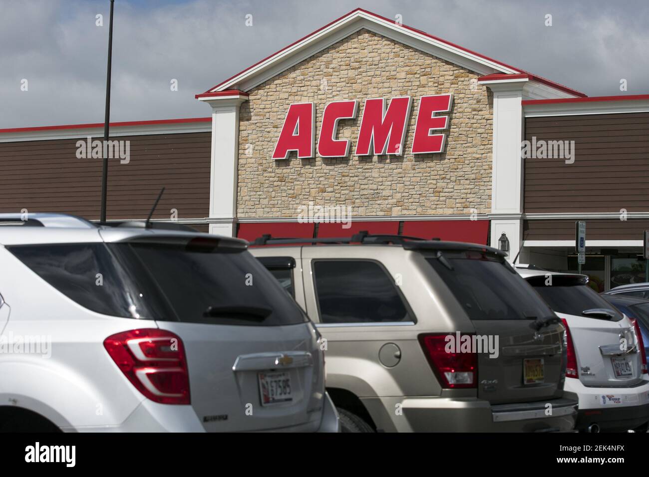 A logo sign outside of Acme retail grocery store location in ...