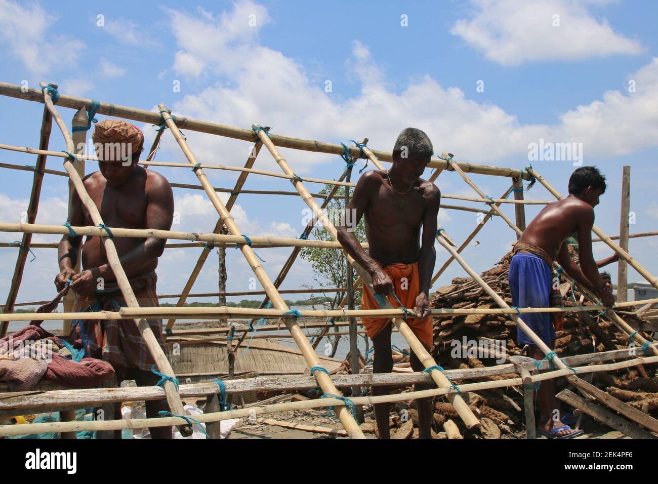 Coastal area's people setting up a makeshift temporary house on the ...