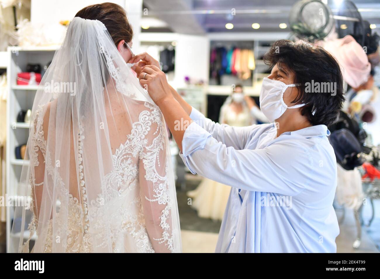 Bridal dress fittings in the Organza boutique during COVID-19 ...