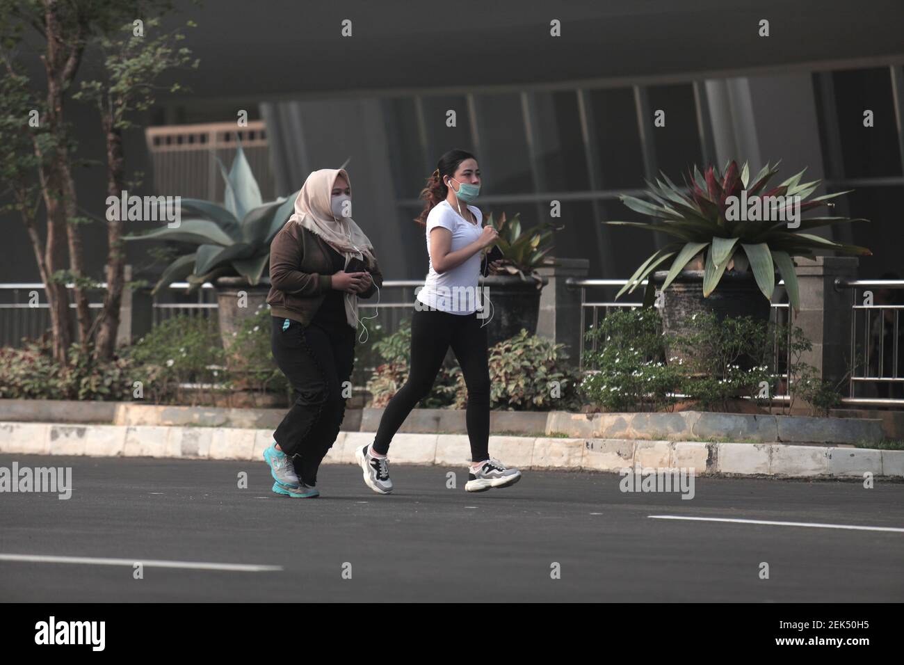 Women jogging at the Gelora Bung Karno (GBK) sports centre during the ...