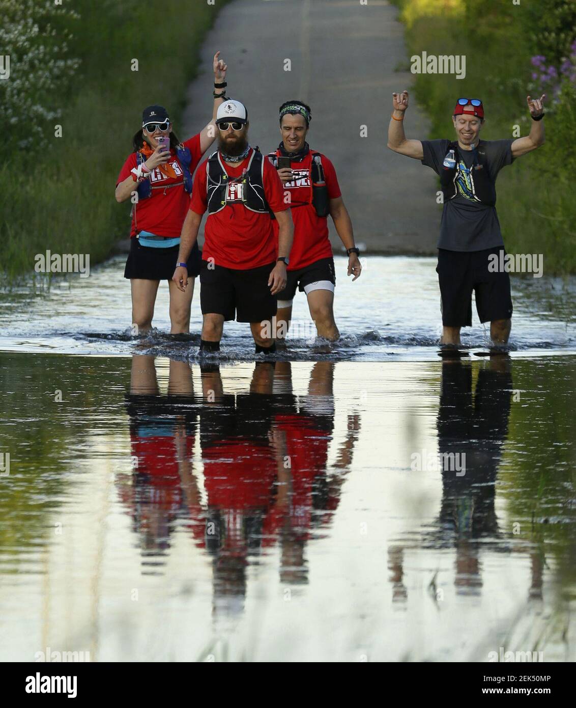 Ryan Mains plows through a flooded path at mile 75 on May 30, 2020, in ...