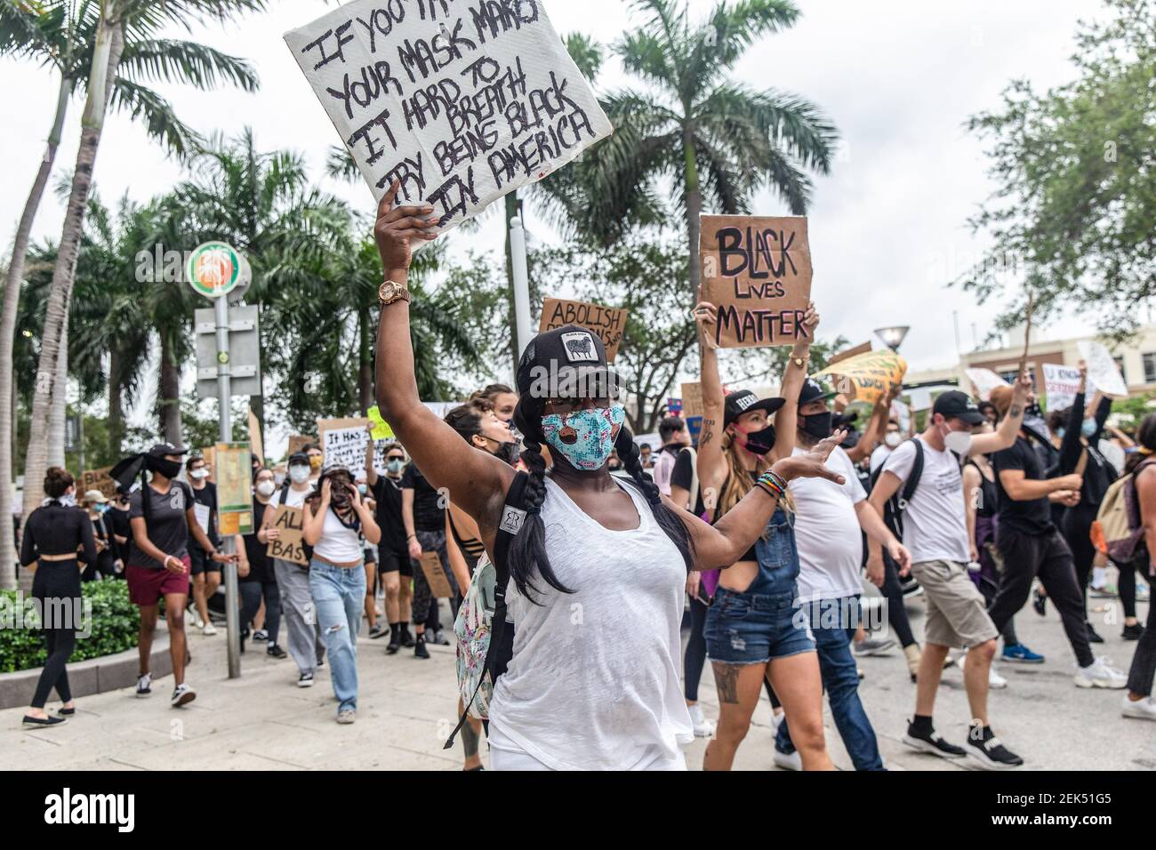 Protesters march through the streets of Miami protesting against police ...