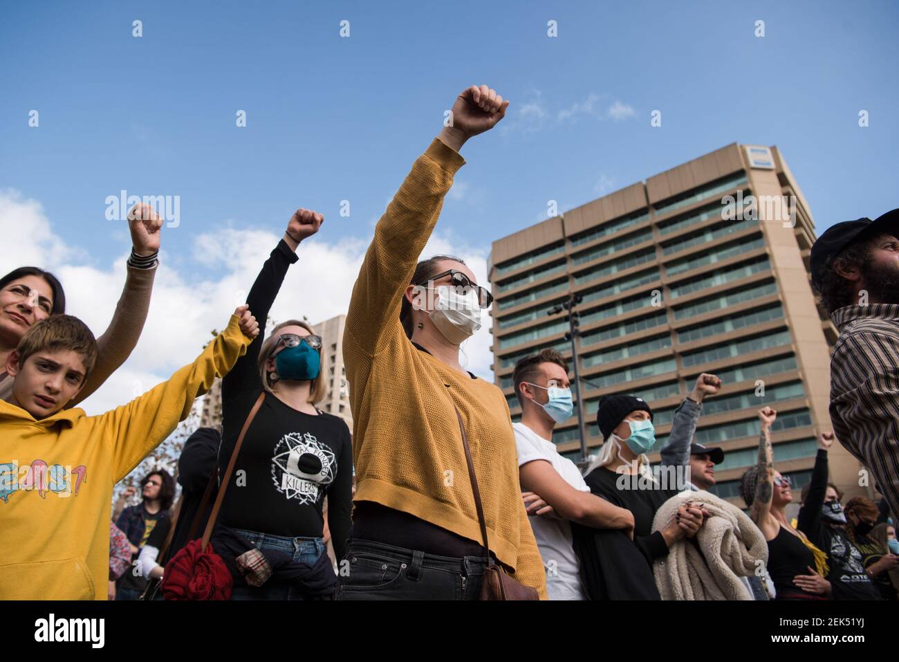 Protesters make gestures during the demonstration. Thousands of ...