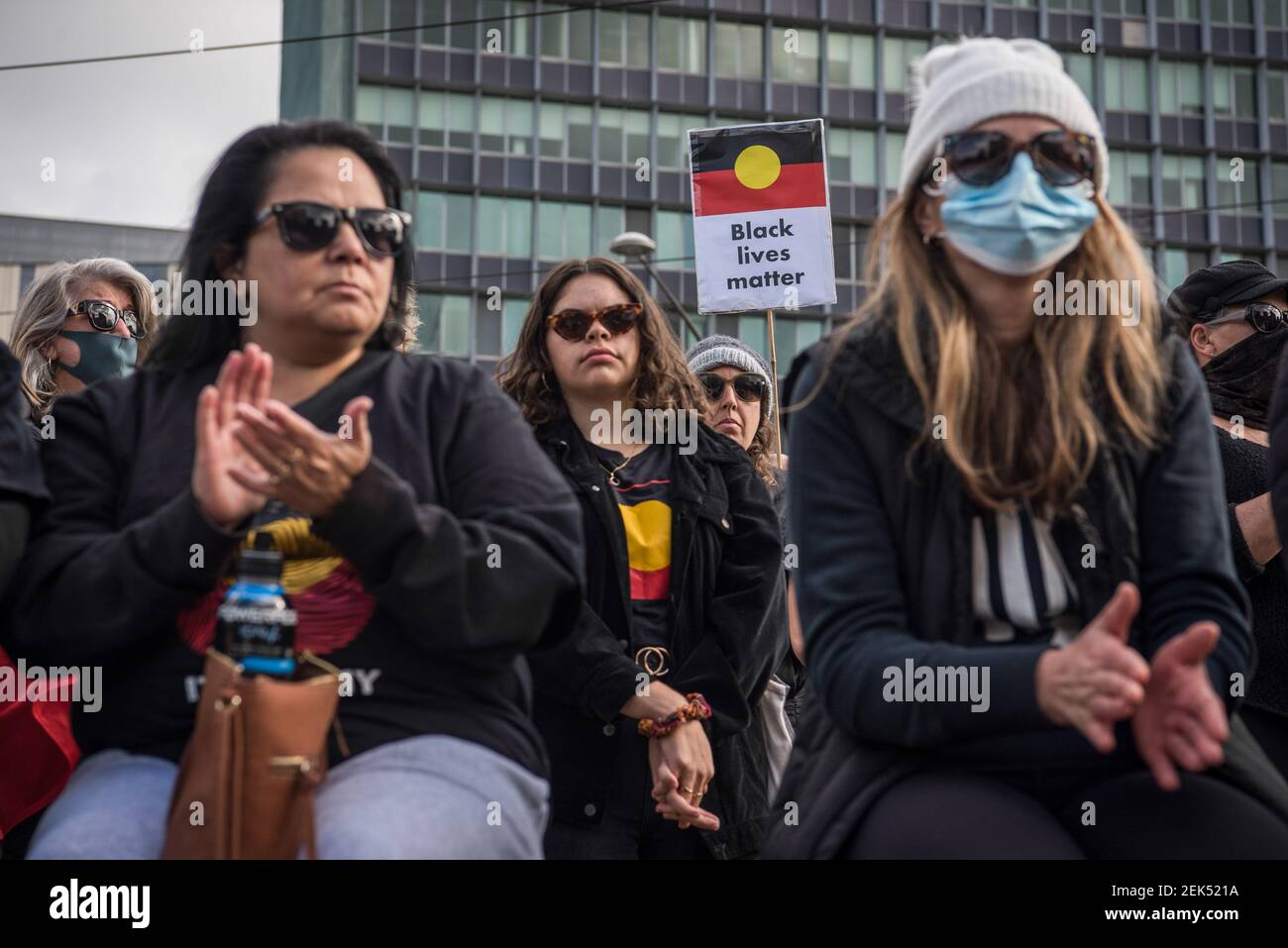 Protesters gather during the demonstration. Thousands of protesters ...