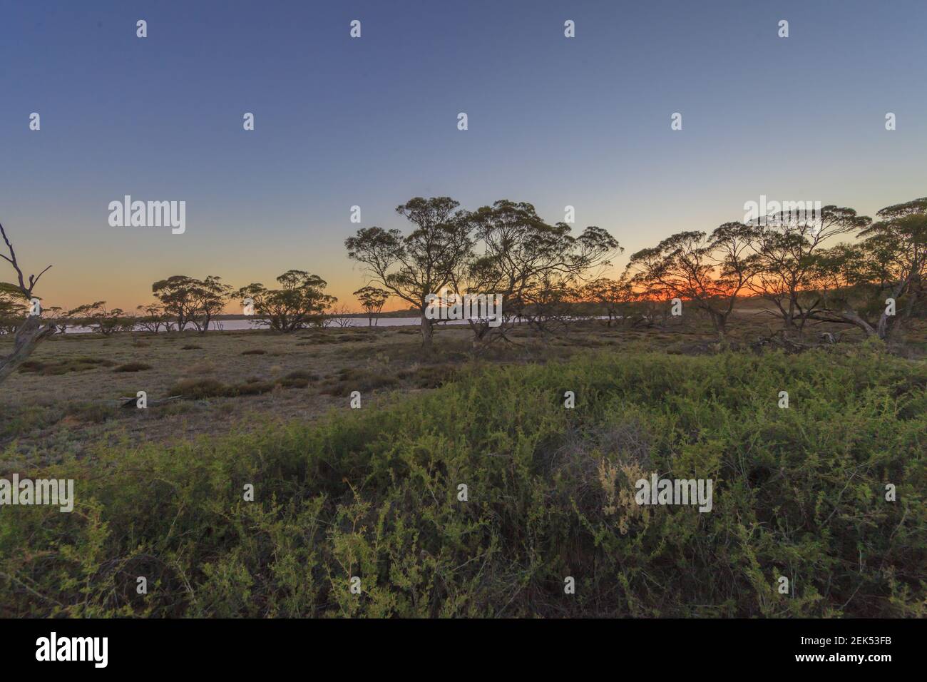Sunset in the Australian outback Stock Photo - Alamy
