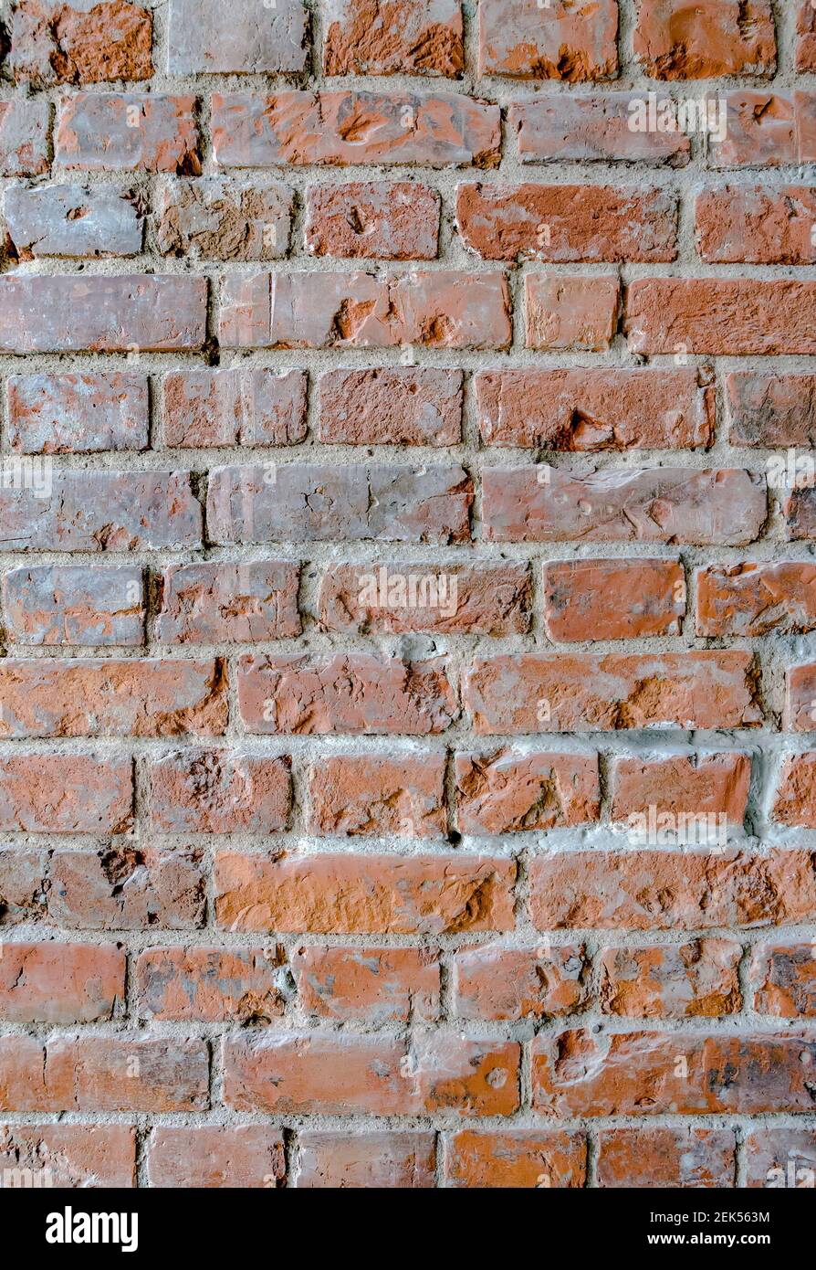 Old red brick wall. Vertical background, loft interior Stock Photo - Alamy
