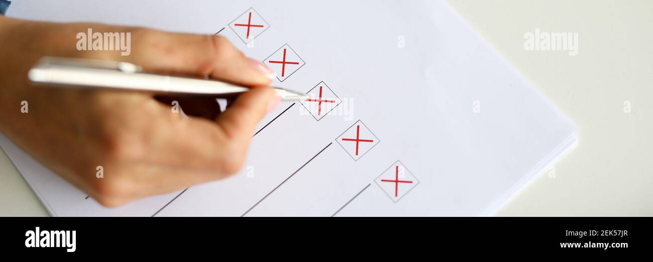 Female hand fill in point in questionnaire closeup on white table Stock ...