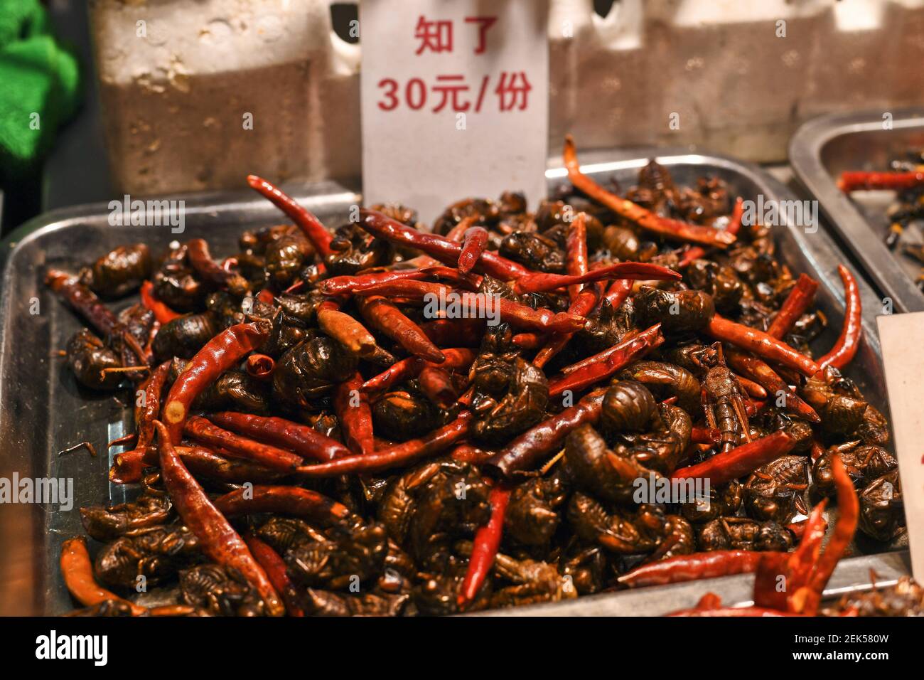 Deep fried insects are sold at a night market in Nanning city, south ...