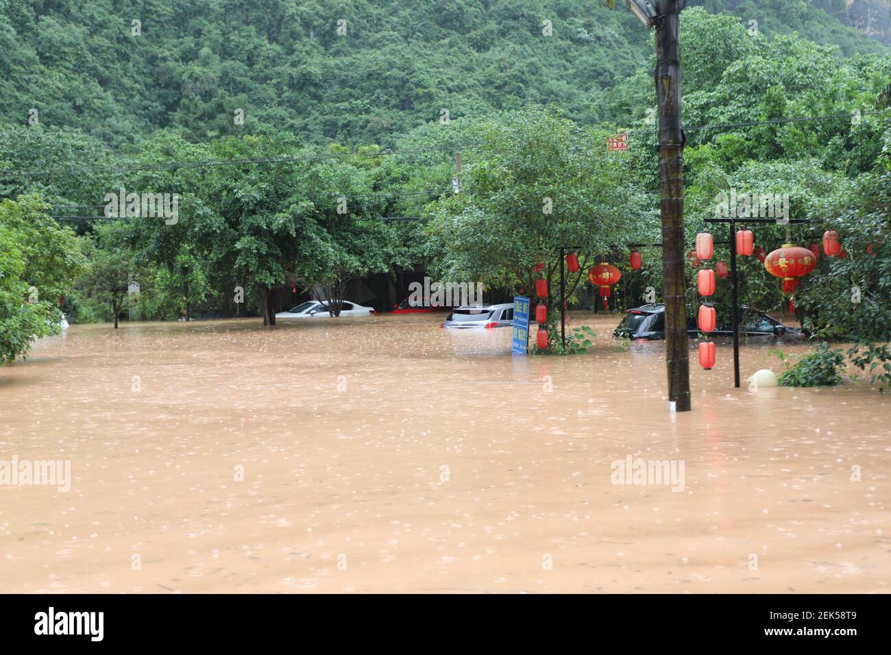 Heavy rain floods a village in Guilin city, south China's Guangxi ...