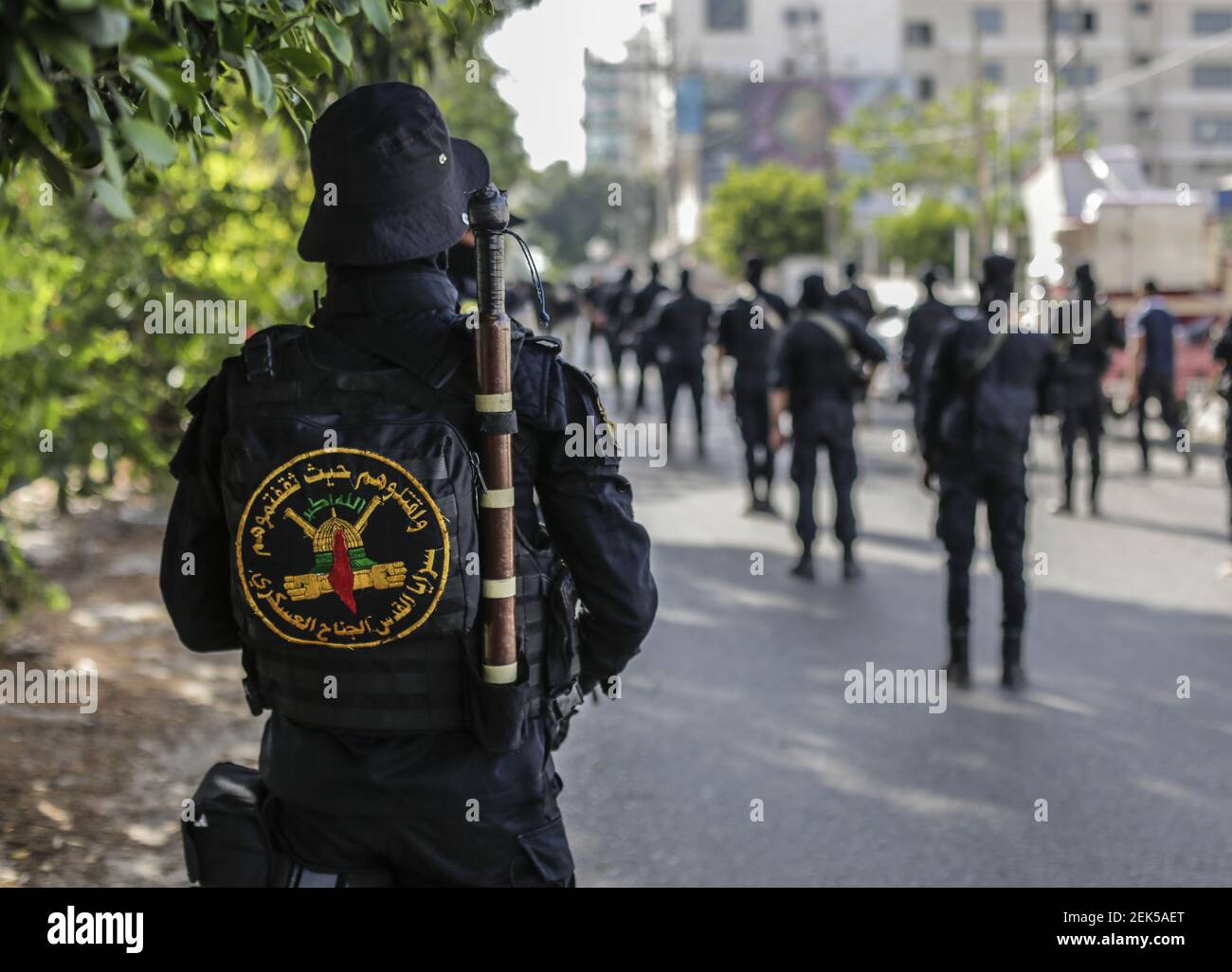 Members of the Palestinian Islamic Jihad militant group participate in ...