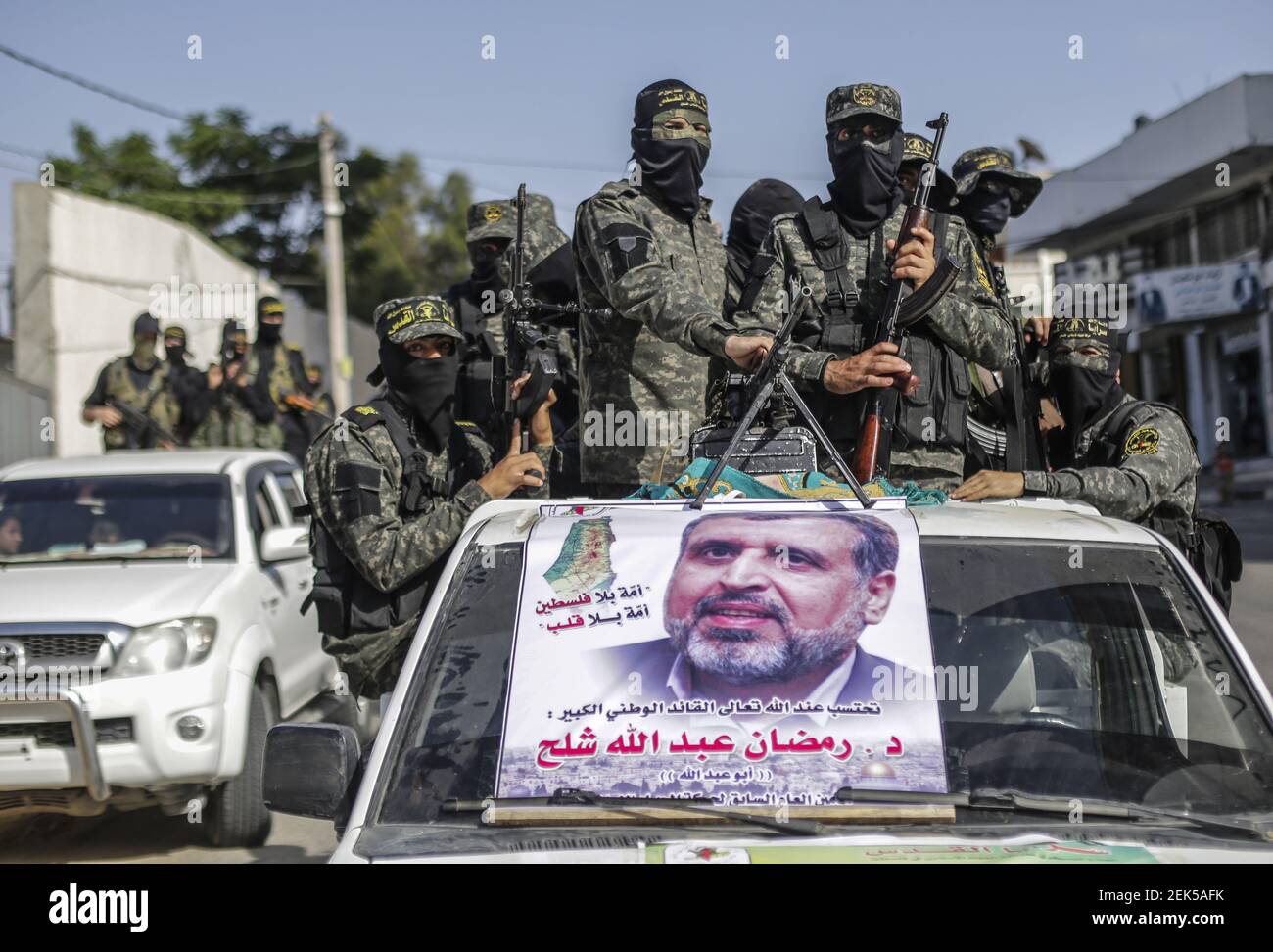 Members of the Palestinian Islamic Jihad militant group participate in ...