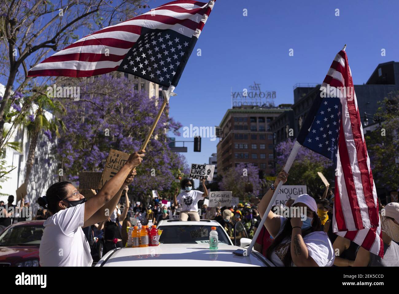 Hollywood: Two protestors fly inverted American flags. When flow upside ...
