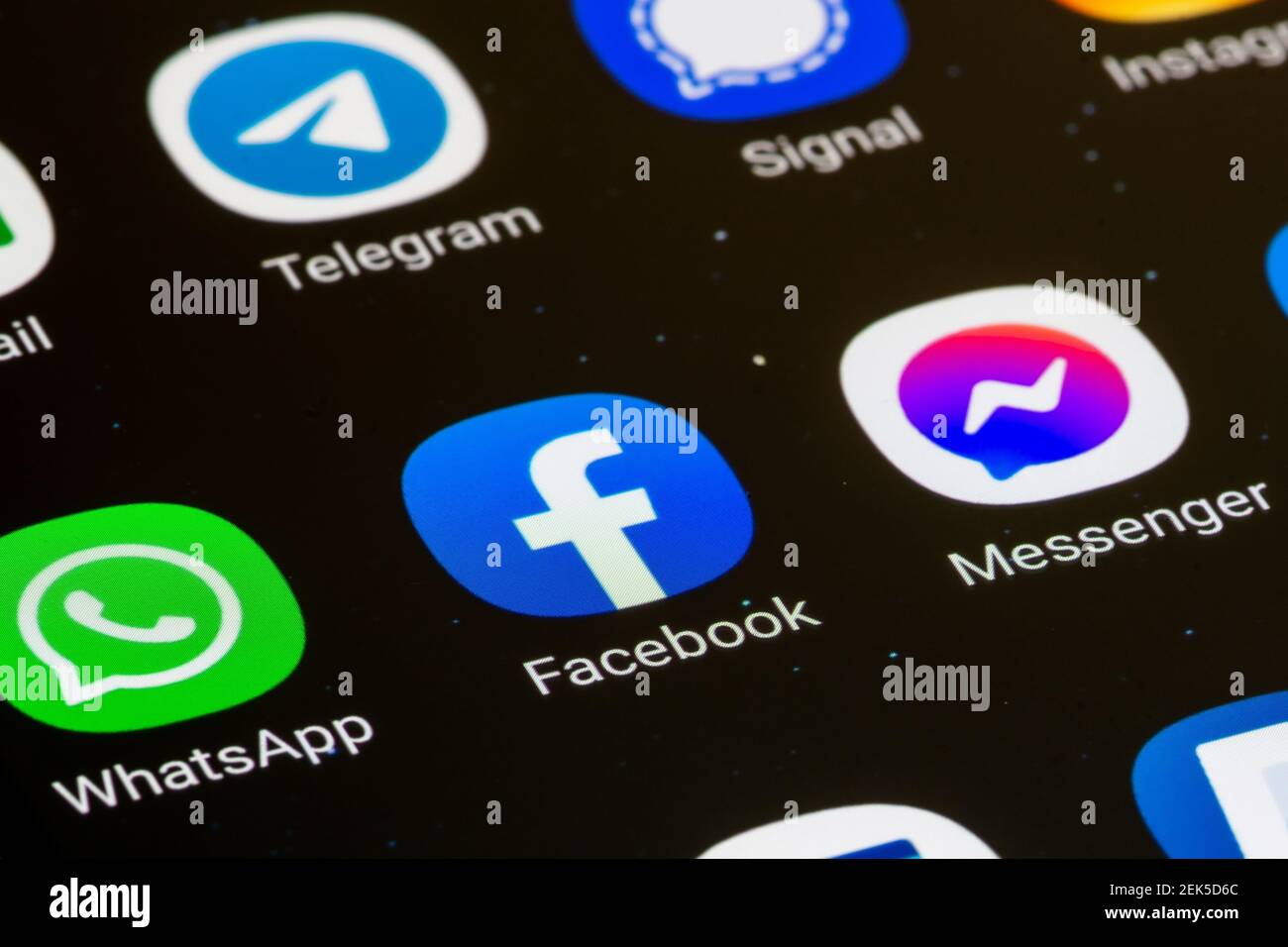 Facebook, Messenger, Whatsapp app displayed together on a smartphone ...
