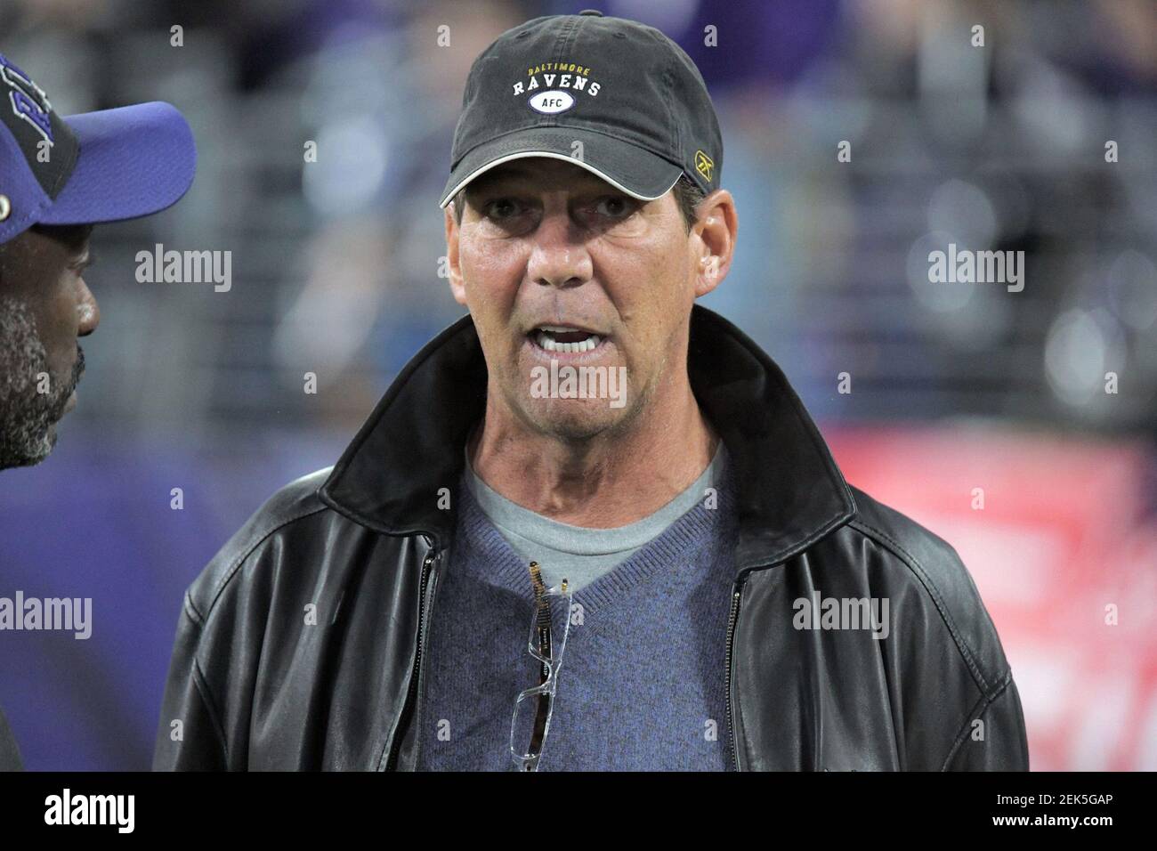 Ravens owner Steve Bisciotti walks on the field before the AFC ...