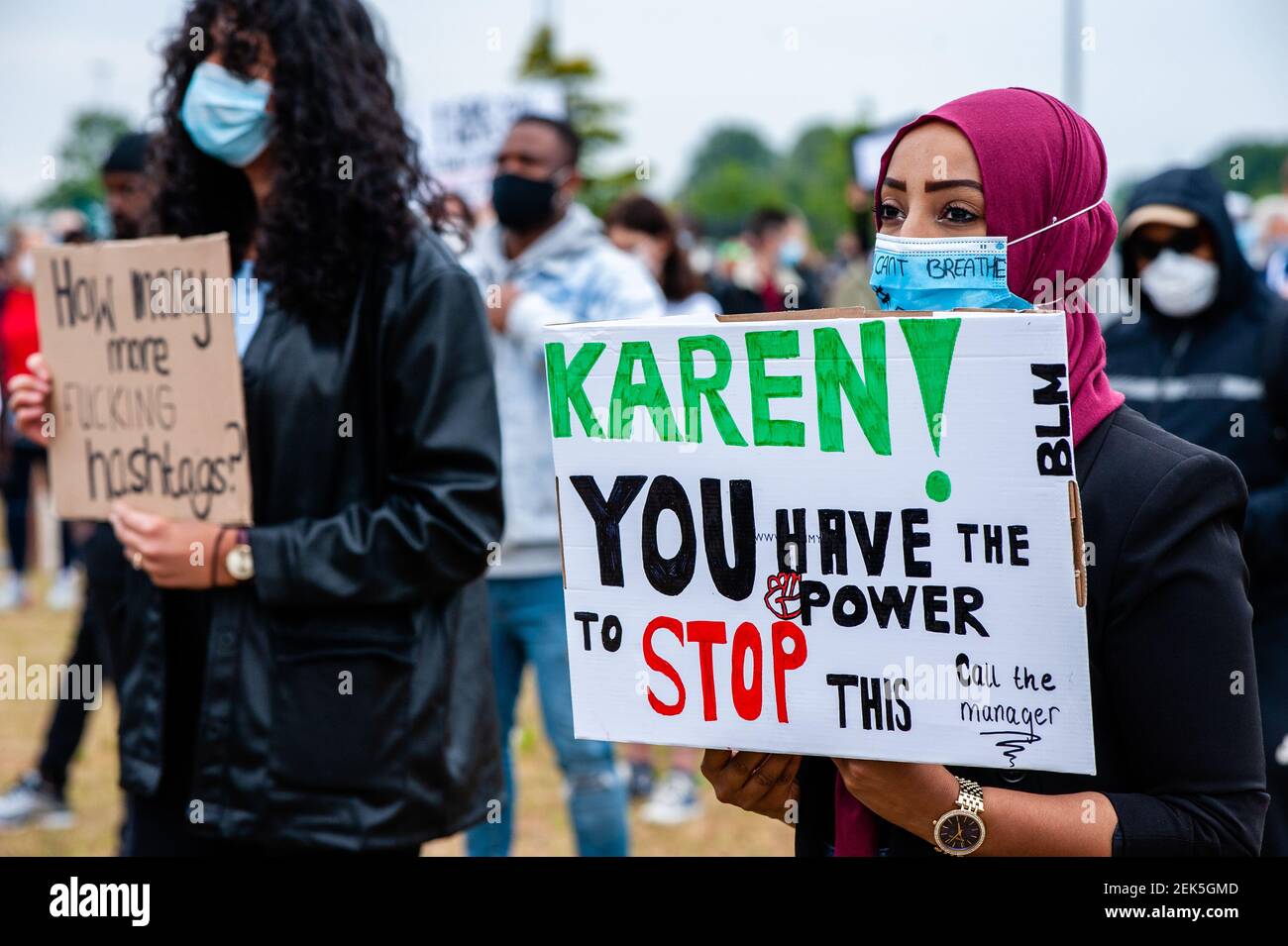 A protester holding an anti racist placard during the demonstration ...
