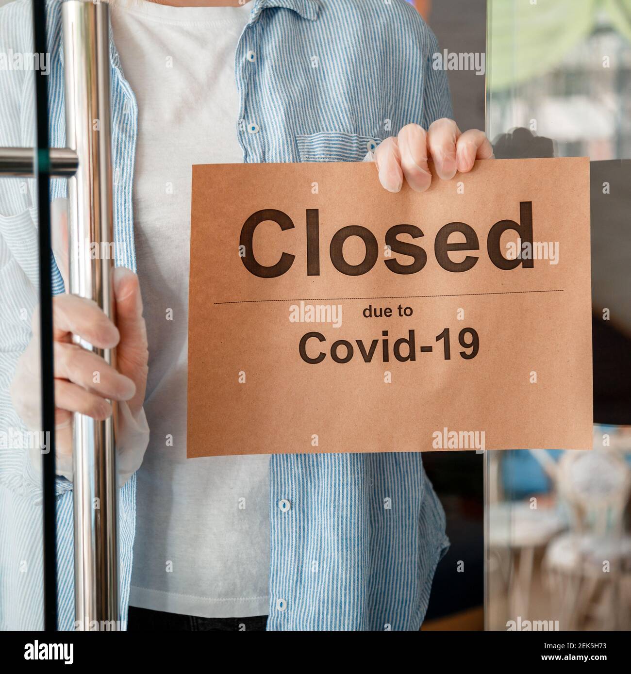 Sign Closed covid 19 lockdown on shop entrance door as new normal ...