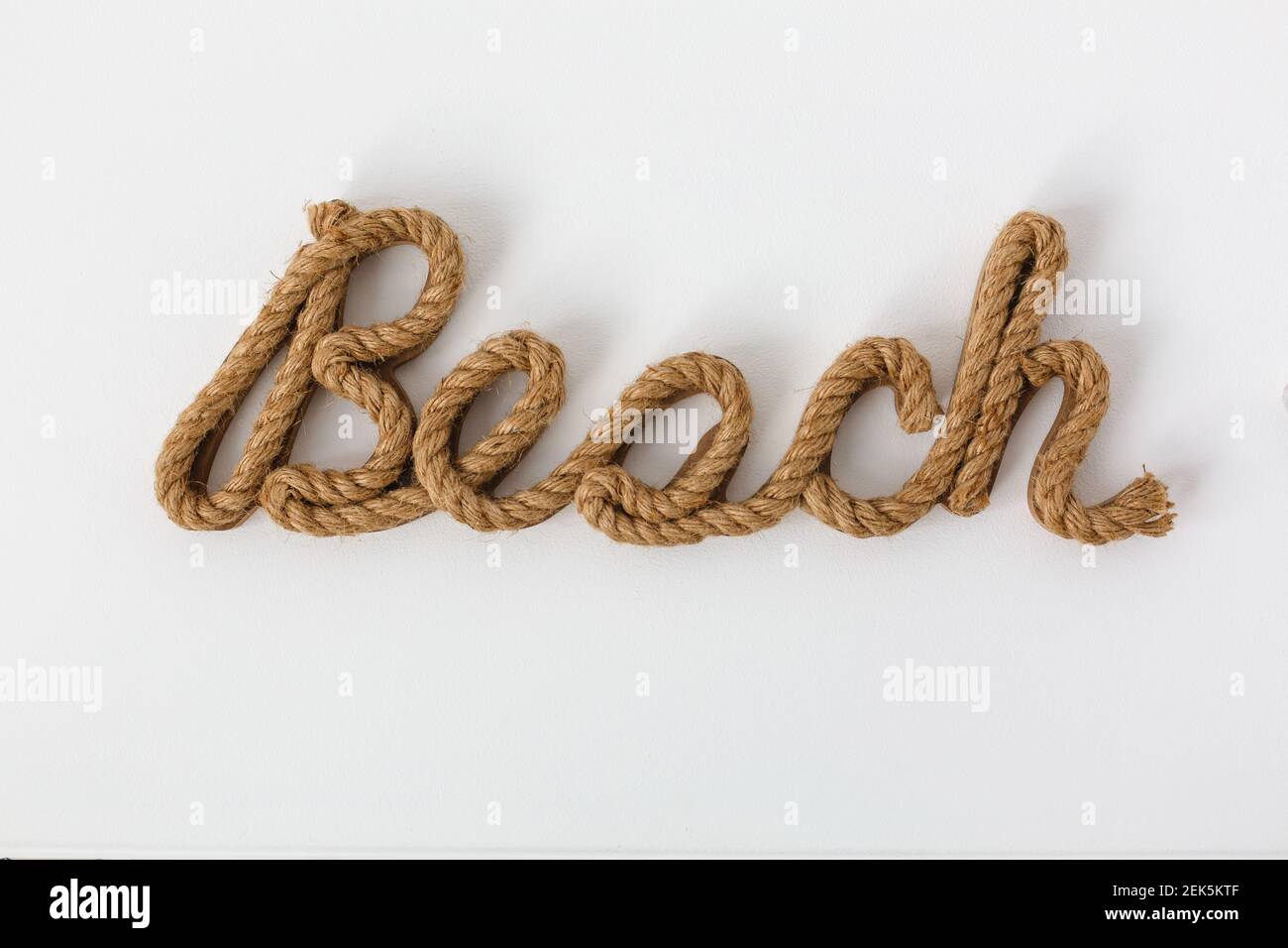 Rope hand drawn lettering Beach Stock Photo - Alamy