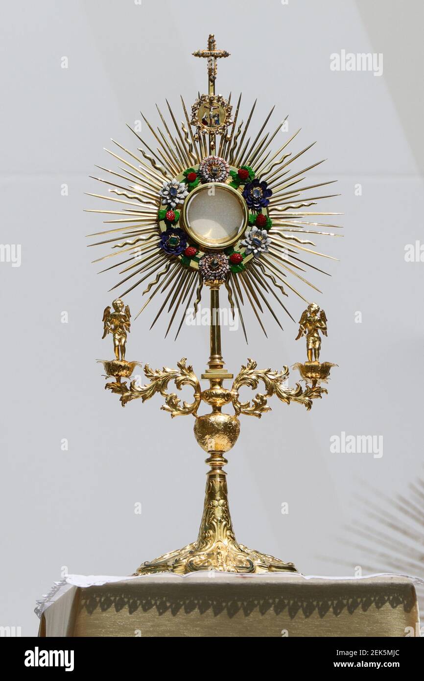 A monstrance seen during procession. Thousands of catholic people took ...