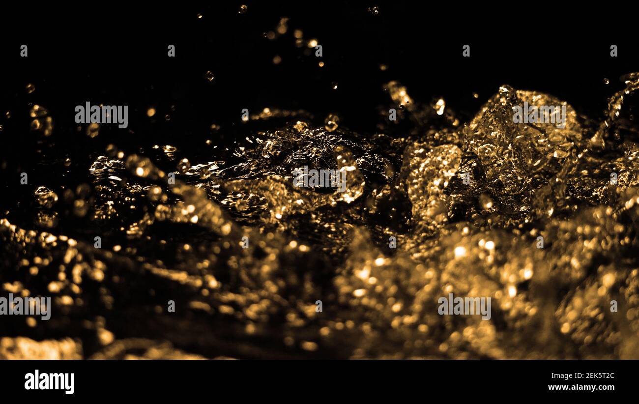 Hi speed close up images of oil liquid from diesel gasoline splashing ...