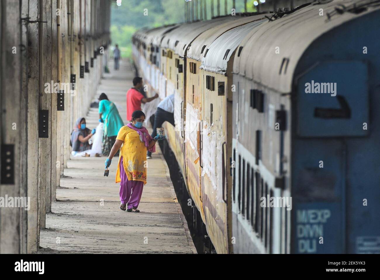 NEW DELHI, INDIA - JUNE 15: Workers prepare a train coach at ...