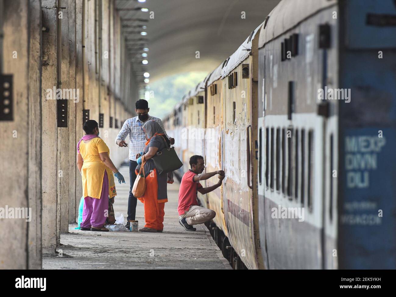 NEW DELHI, INDIA - JUNE 15: Workers prepare a train coach at ...