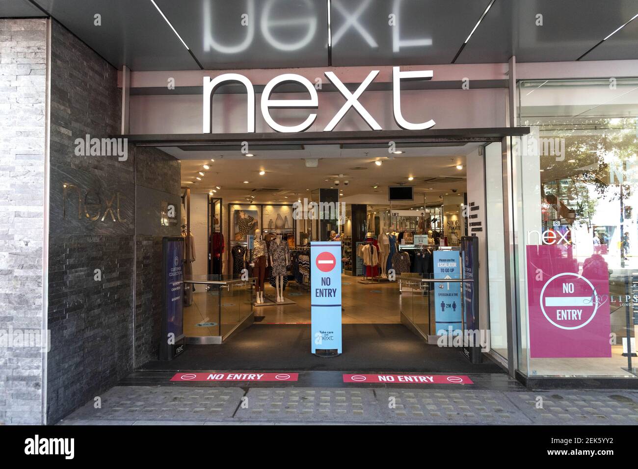 No entry signs are displayed at the doors of the Next shop on London’s ...