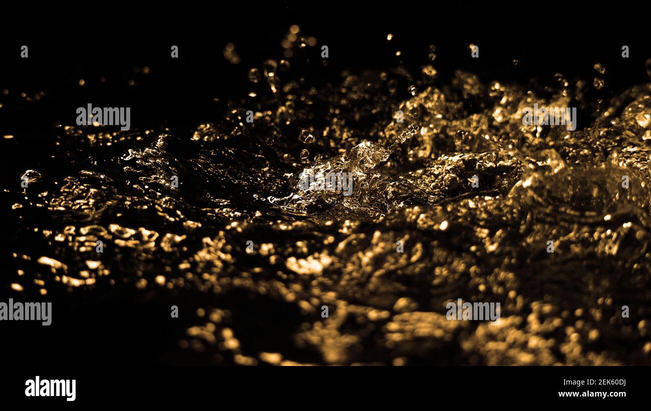 Hi speed close up images of oil liquid from diesel gasoline splashing ...