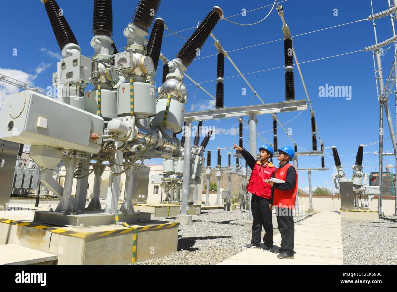 SHANNAN, CHINA - JUNE 17, 2020 - Members of the State Grid patrol the ...