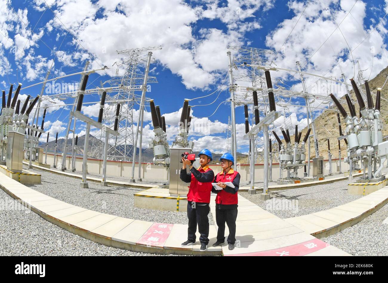 SHANNAN, CHINA - JUNE 17, 2020 - Members of the State Grid patrol the ...